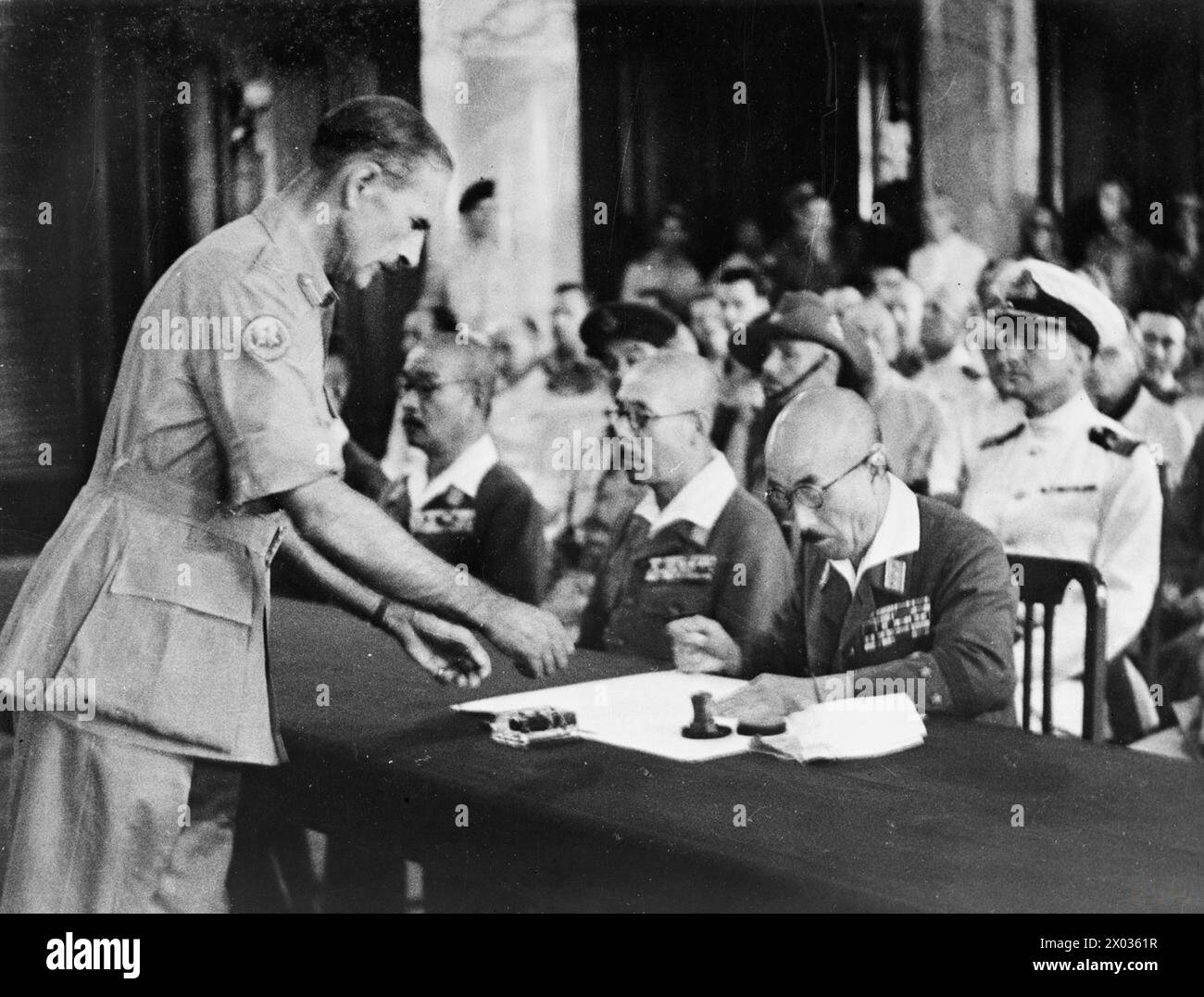 JAPANESE SURRENDER OF SINGAPORE, 1945 - A member of the Japanese ...