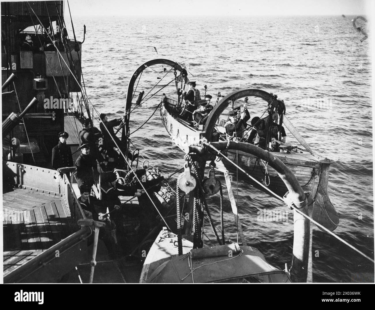 THE ROYAL NAVY DURING THE SECOND WORLD WAR - The seaboat being hoisted ...