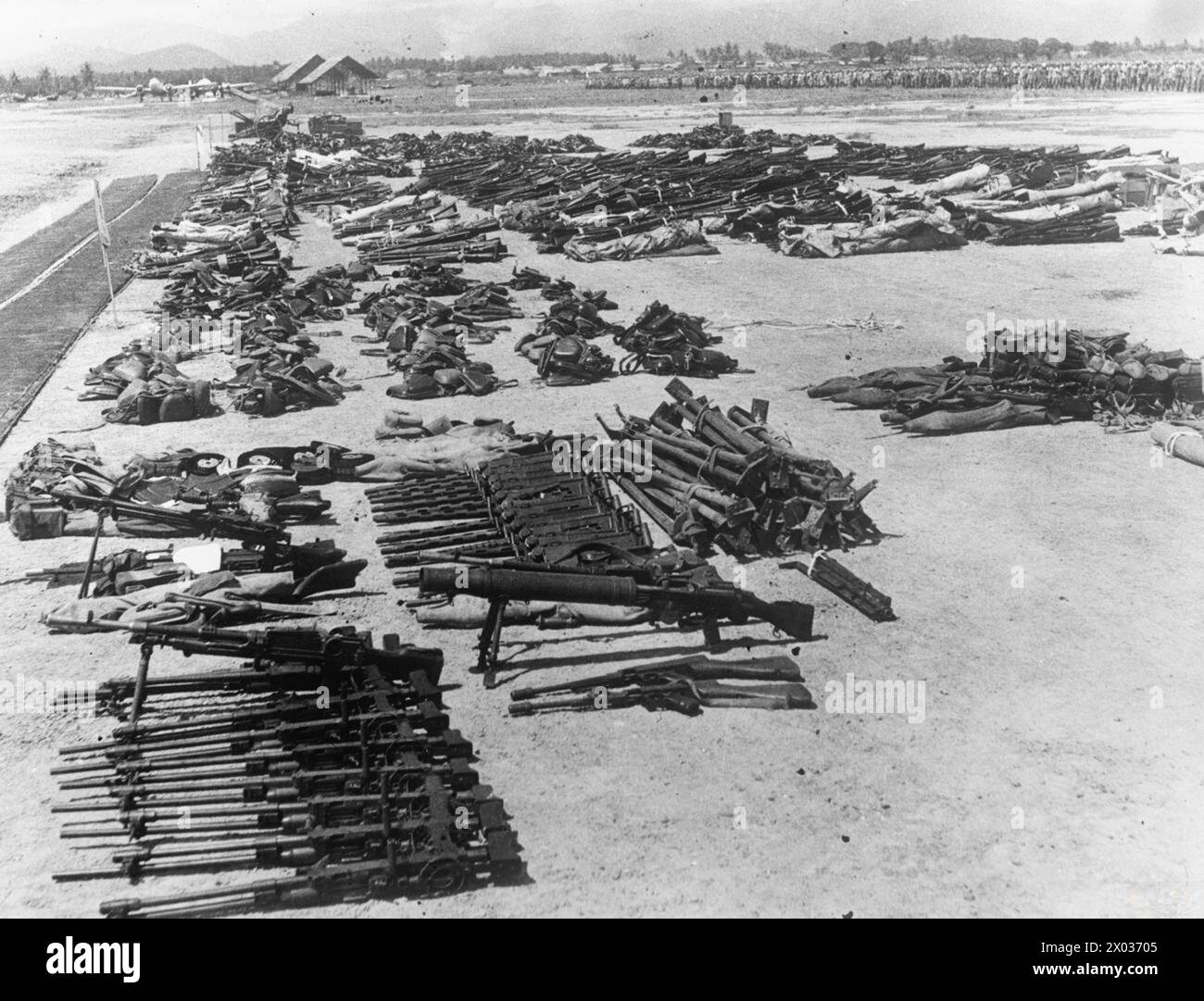 JAPANESE SURRENDER IN MALAYA, 1945 - Piles of Japanese weapons and ...