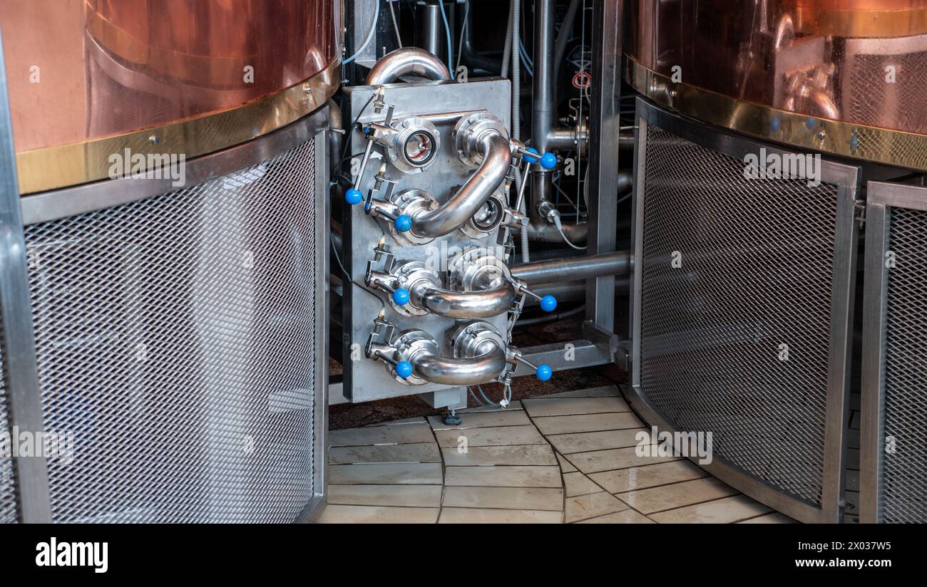 Intricate piping and pressure gauges at a small-scale brewery Stock ...