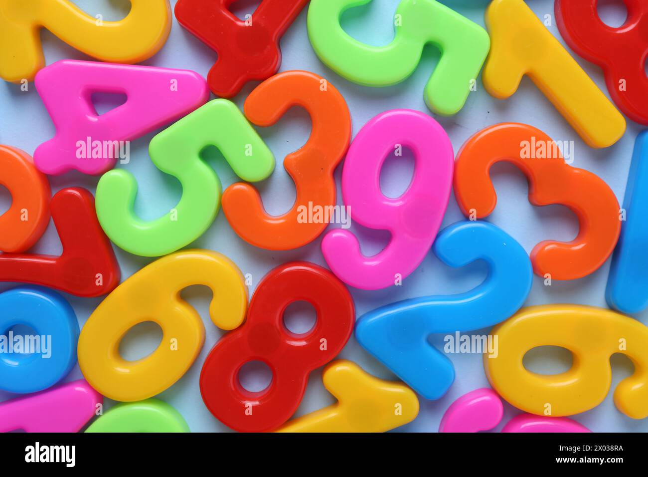 Colorful numbers on blue background, top view Stock Photo - Alamy