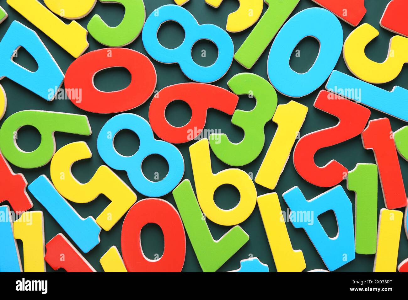 Colorful numbers on green background, top view Stock Photo - Alamy