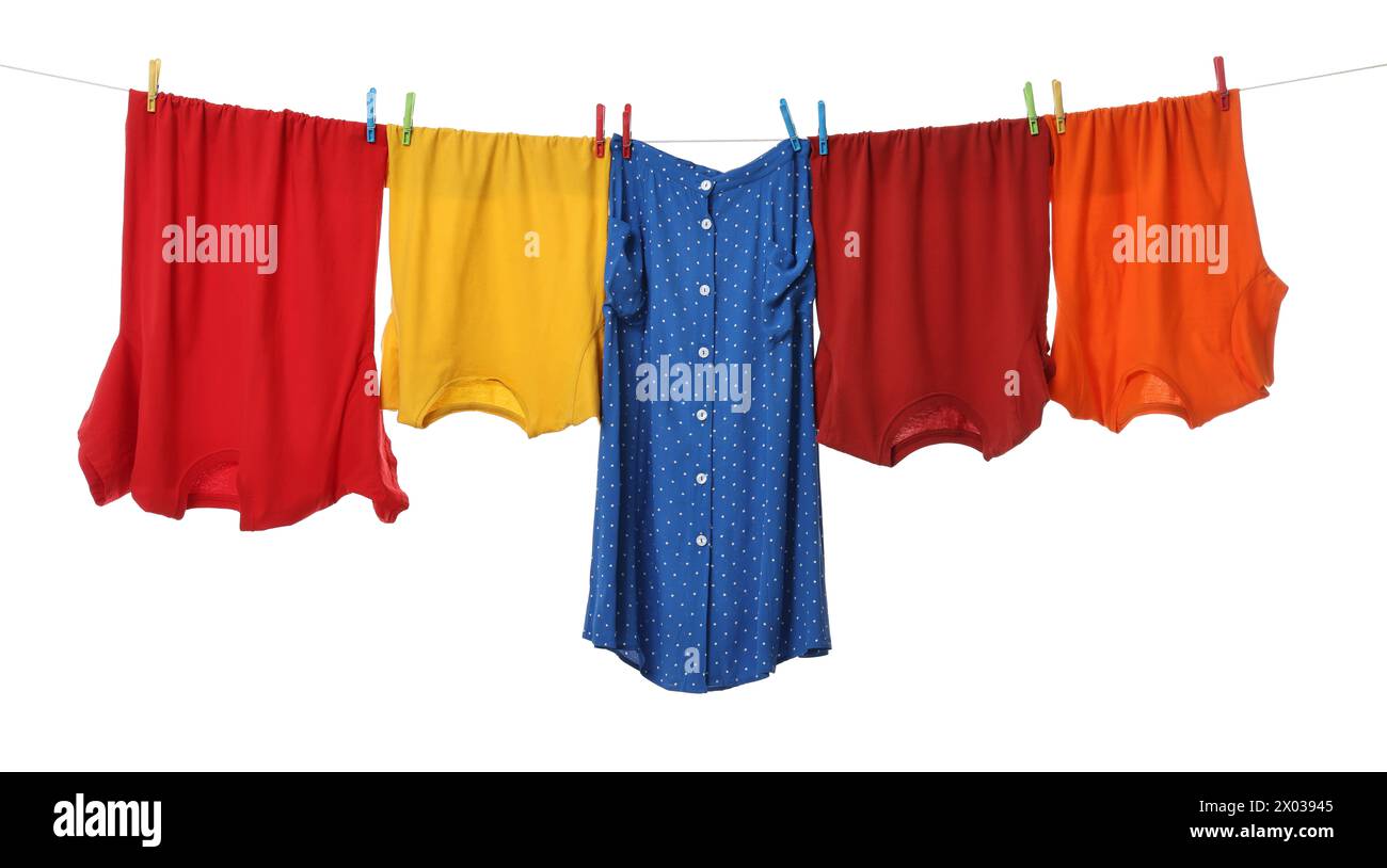 Different clothes drying on laundry line against white background Stock ...
