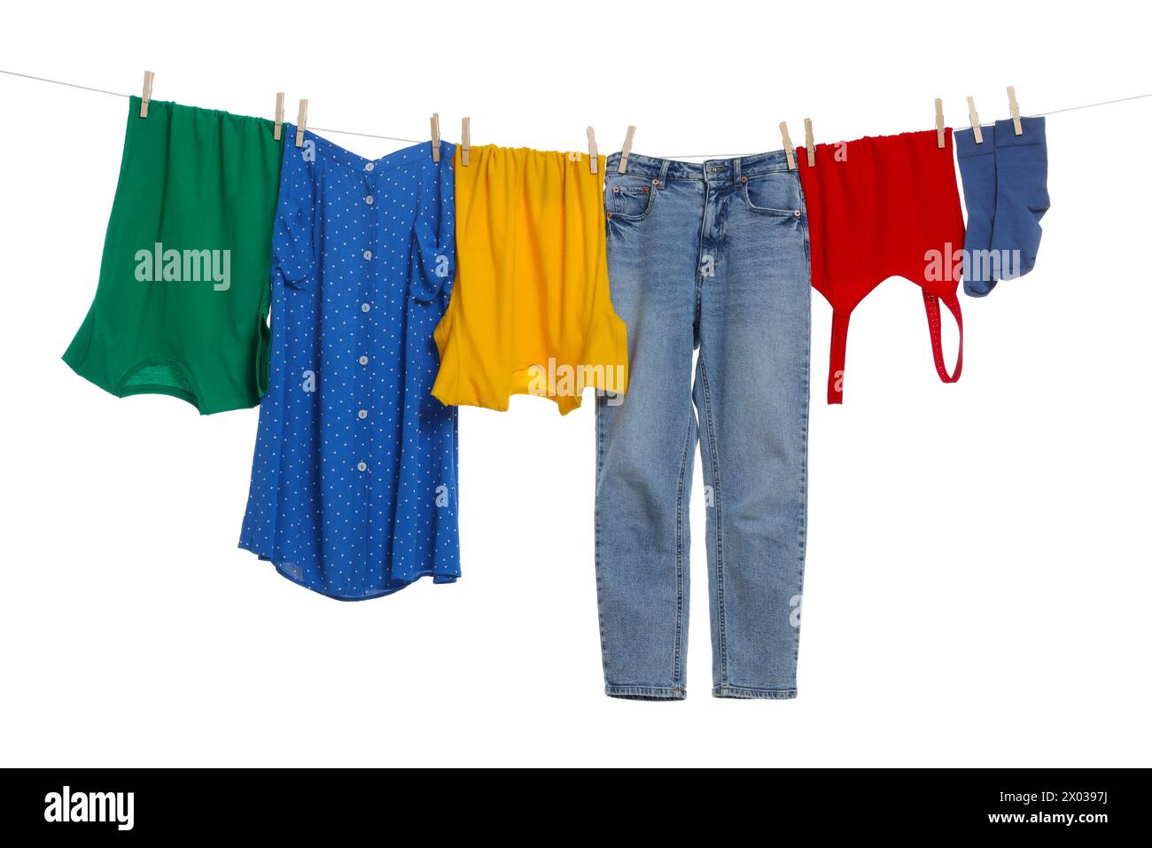 Different clothes drying on laundry line against white background Stock ...