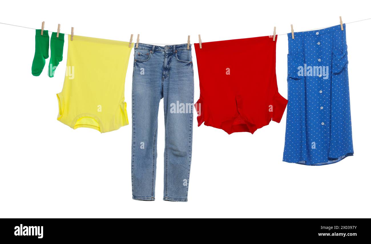 Different clothes drying on laundry line against white background Stock ...