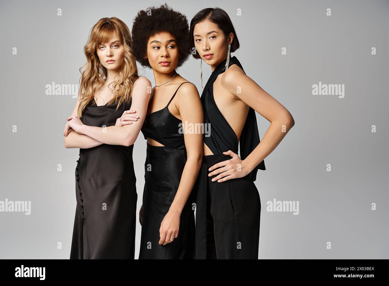 Three beautiful women of different ethnicities standing gracefully ...