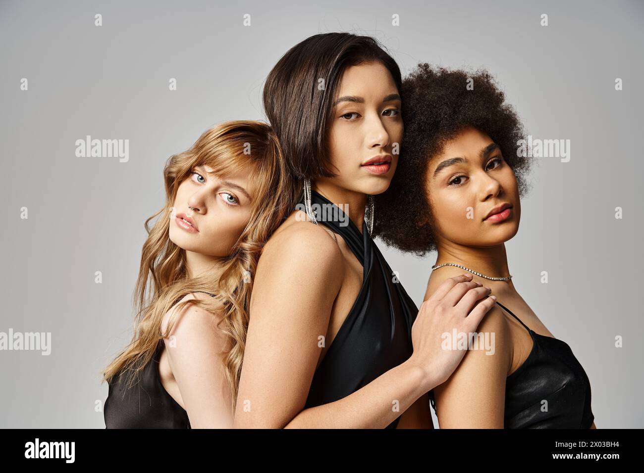 A group of women of different ethnicities standing together, showcasing ...