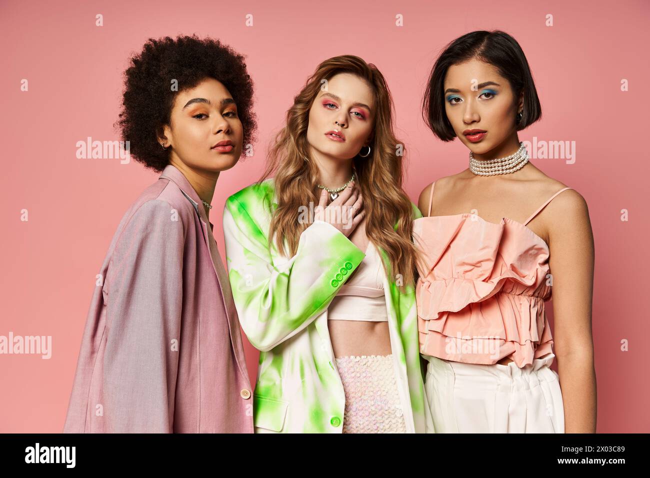 Three beautiful women of diverse backgrounds stand together, showcasing ...