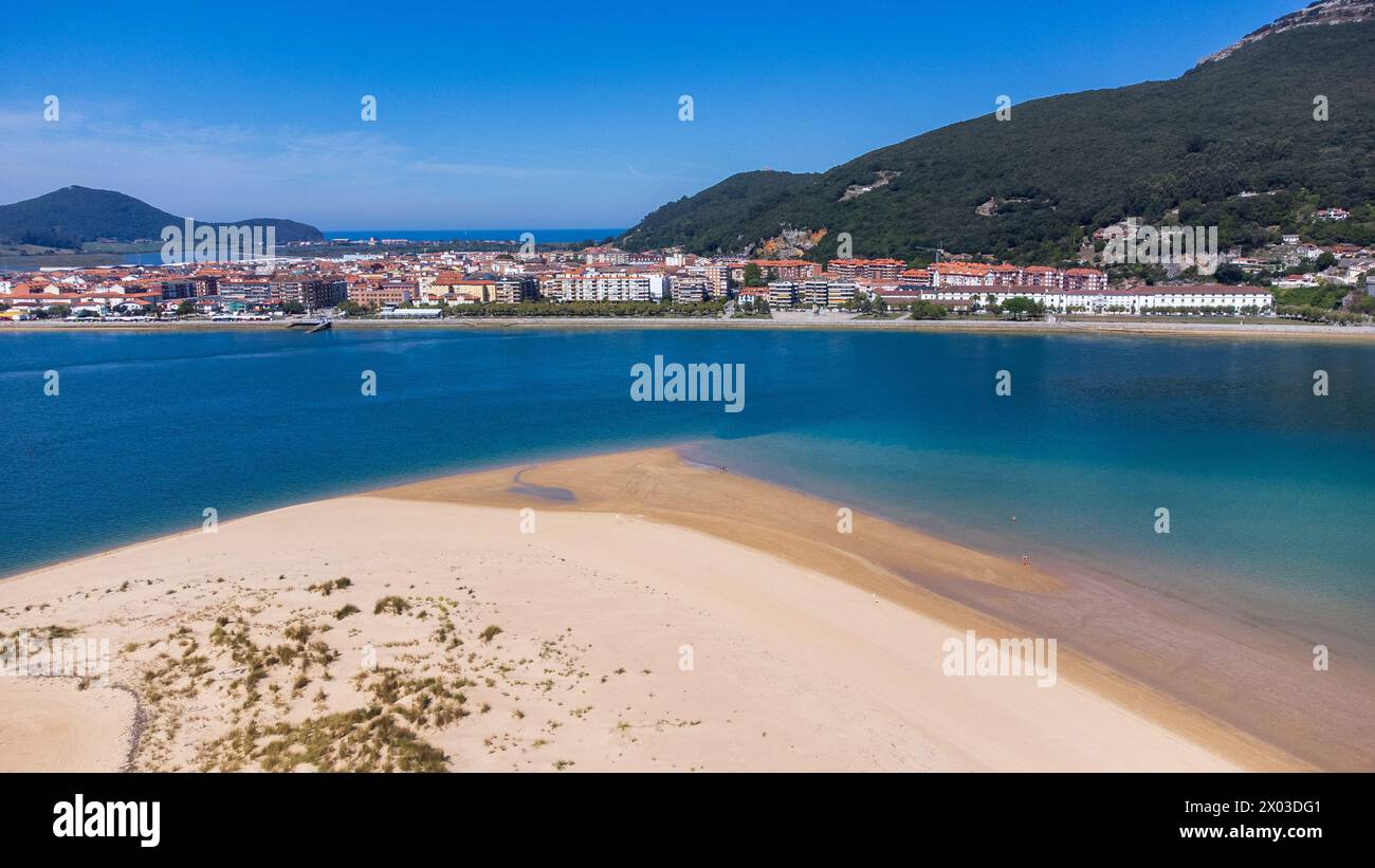 Aerial view of the sandy spit of Laredo, beach washed by the waters of ...
