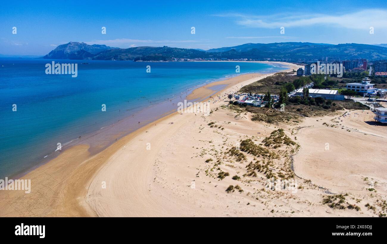 Aerial view of the sandy spit, La Salvé beach, bay, and the city of ...