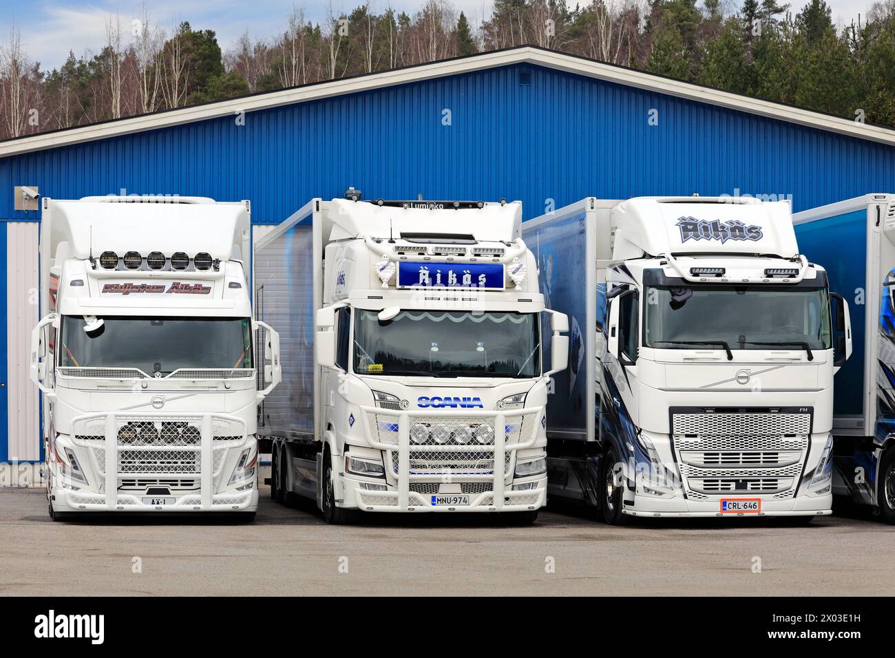 Three new, beautifully customized Volvo and Scania trucks parked side ...