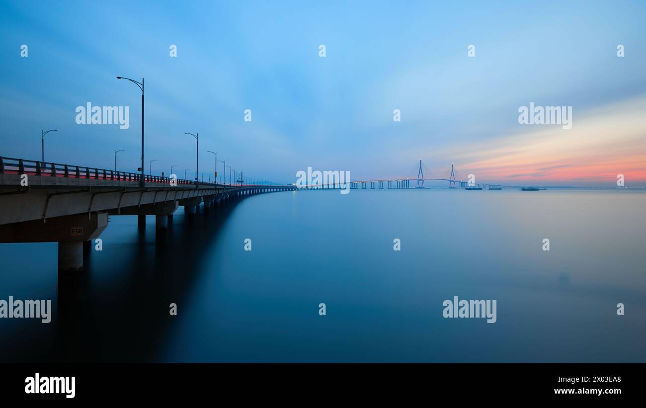 Sunset and night landscape of Incheon Bridge, South Korea Stock Photo ...
