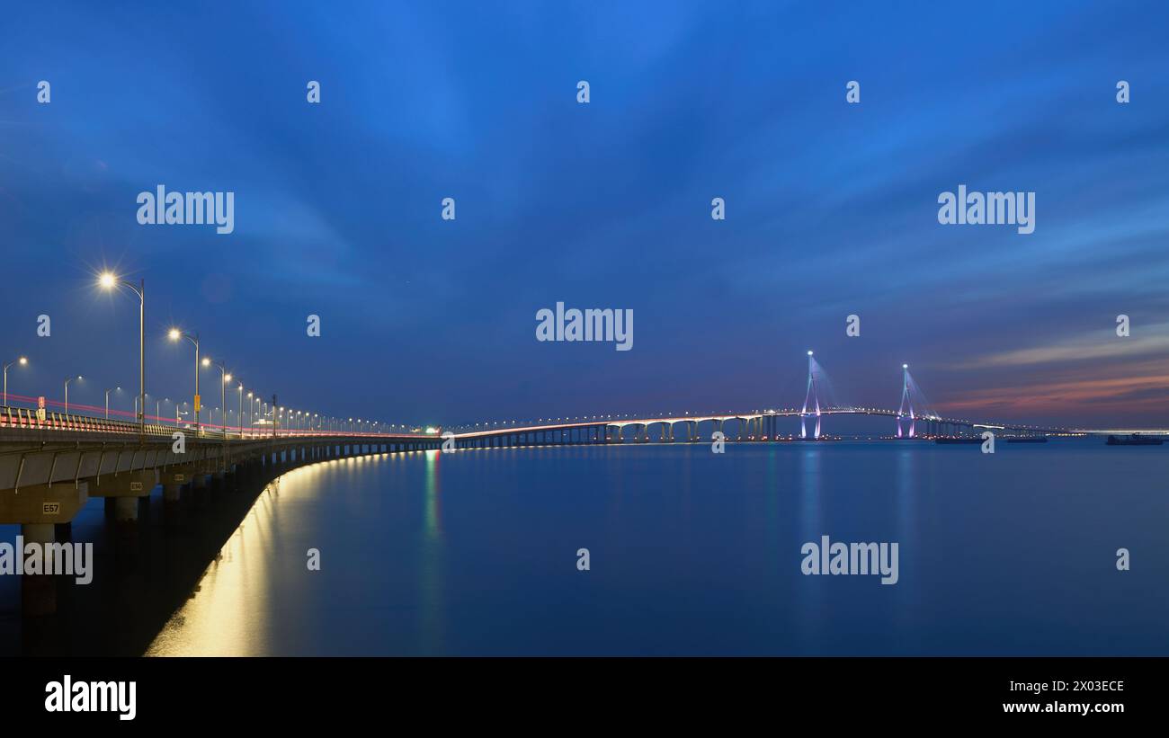 Sunset and night landscape of Incheon Bridge, South Korea Stock Photo ...
