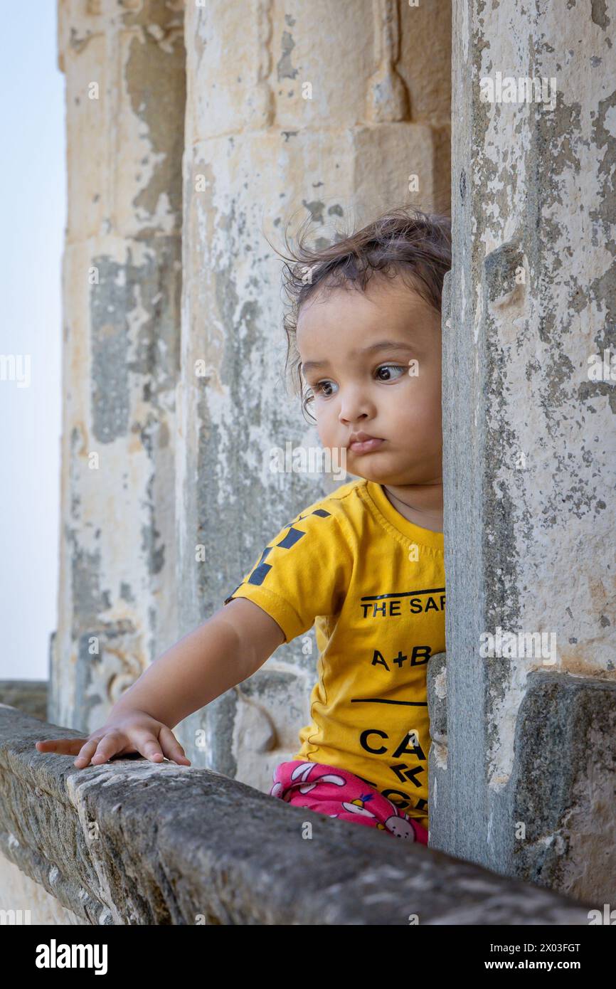 innocent child cute facial expression at outdoors at morning from flat ...
