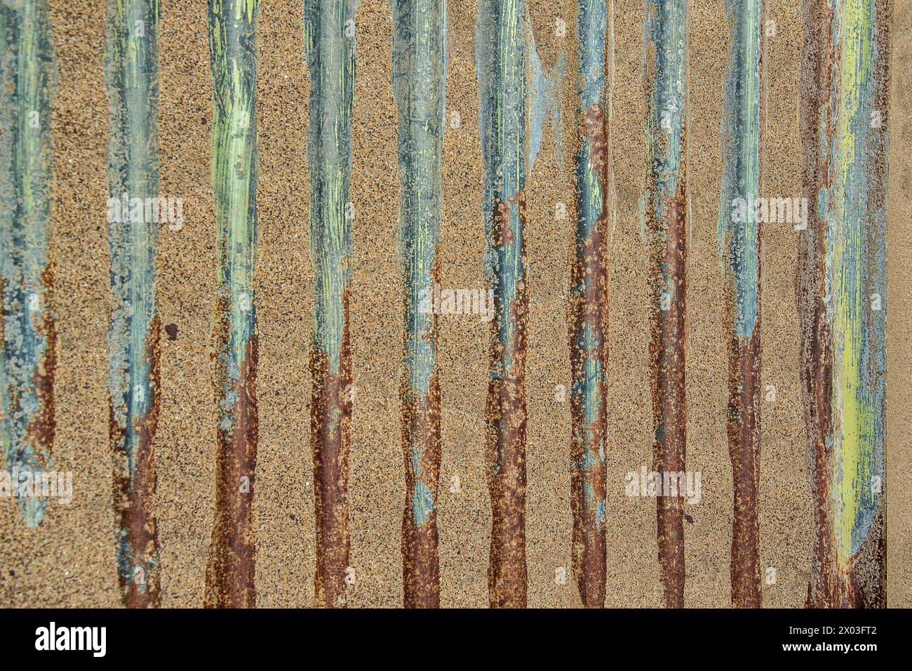 Lime green painted corrugated iron, the remains of civilisation in the ...