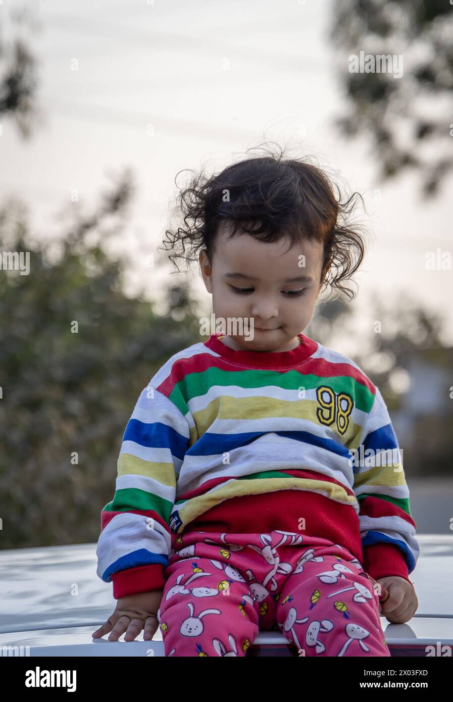 isolated child cute facial expression at morning with blurred ...