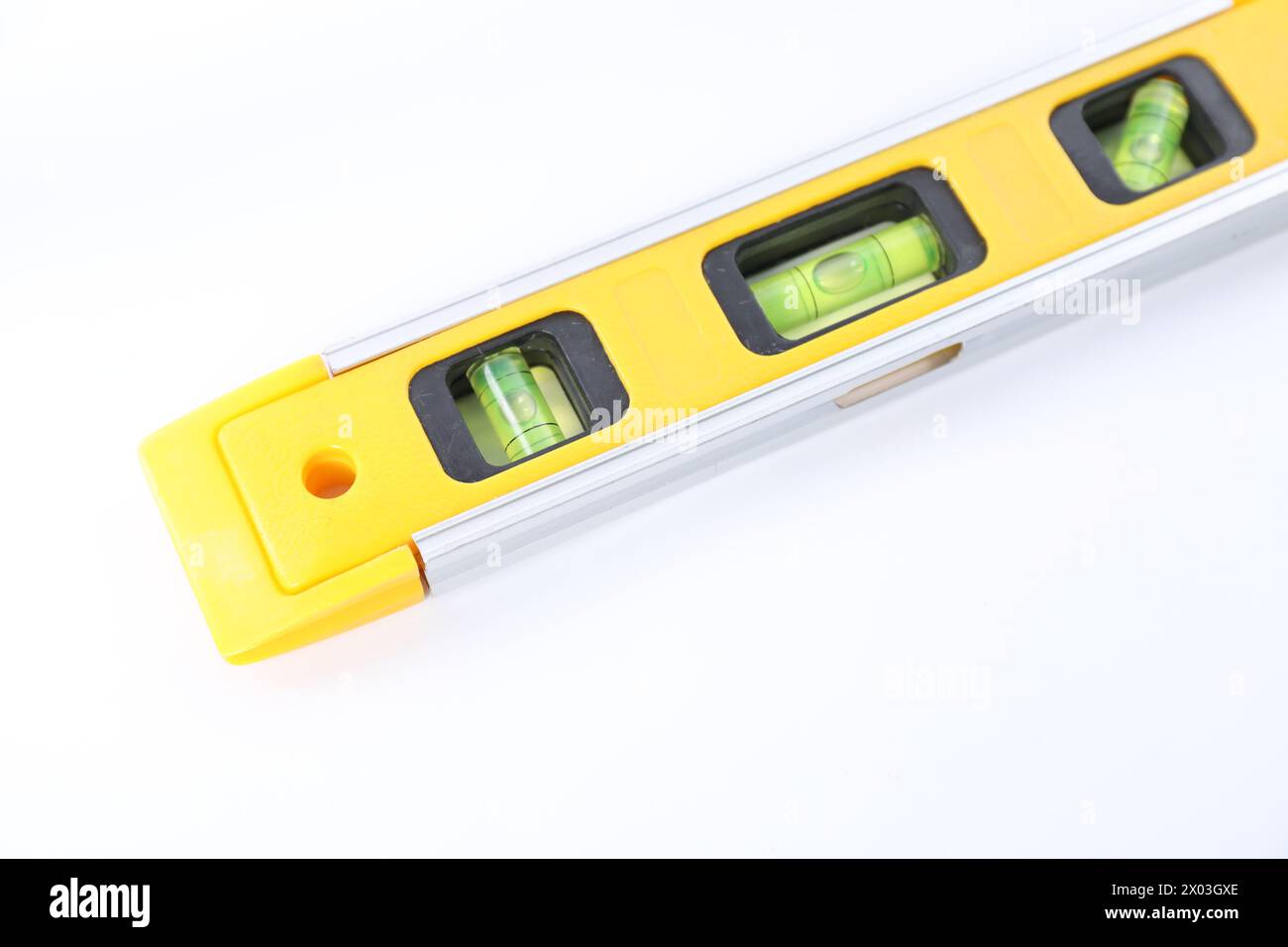Yellow building level isolated on white. Construction tool Stock Photo ...