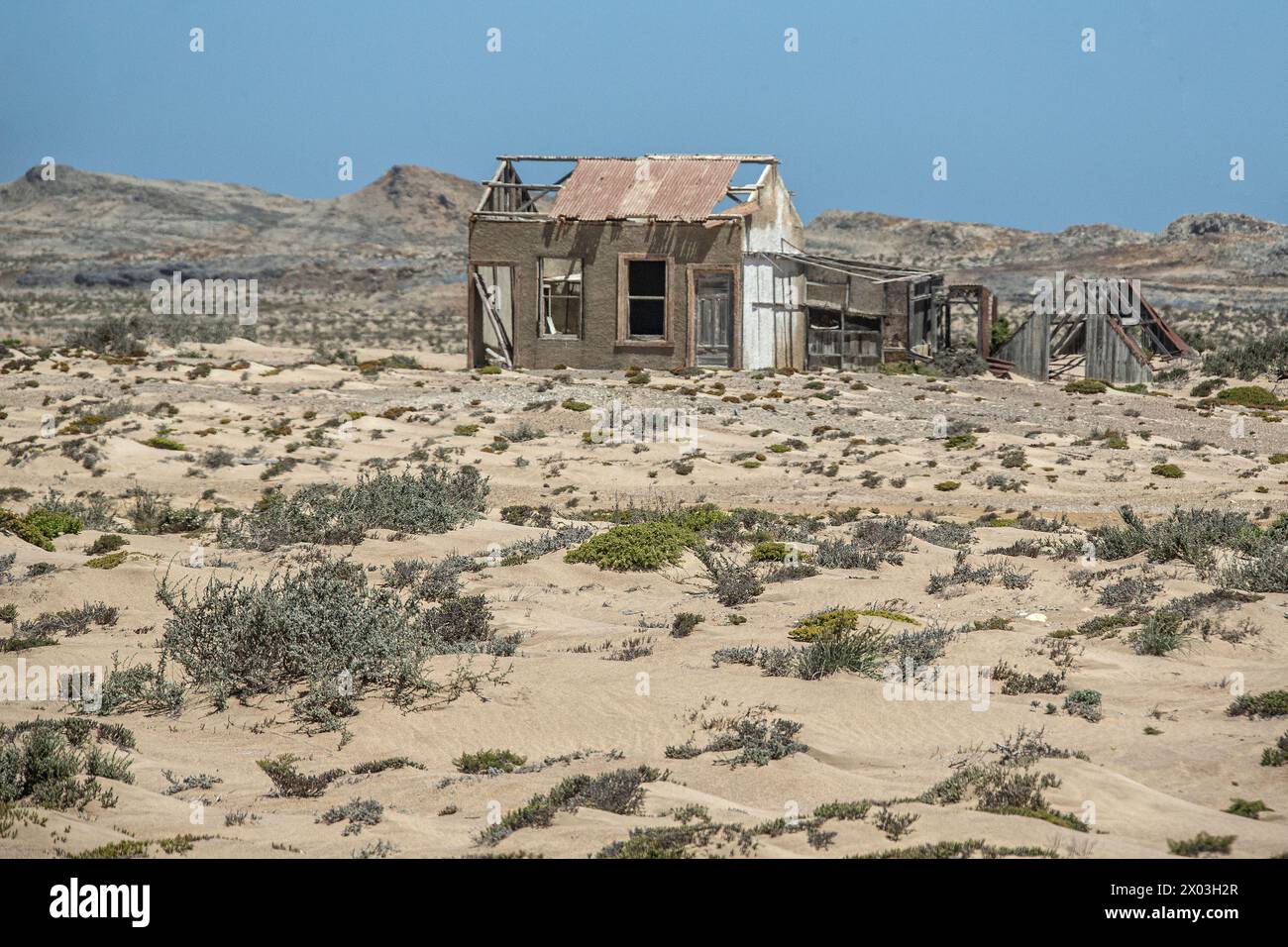 Abandoned, miner's house, with outhouses, preserved by the dry desert ...