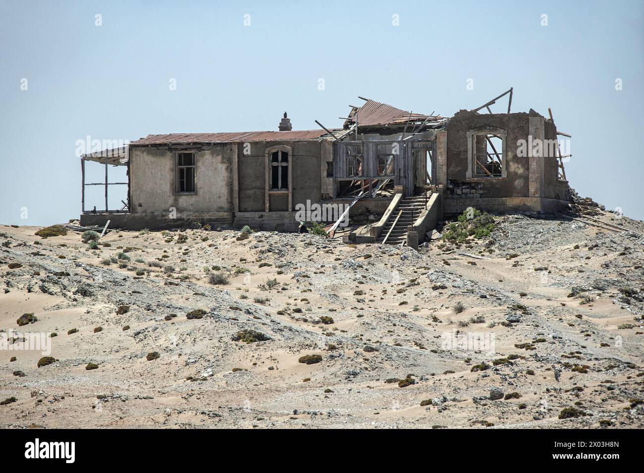 Abandoned, Bogenfels mine manager's house, up on the hill; preserved by ...