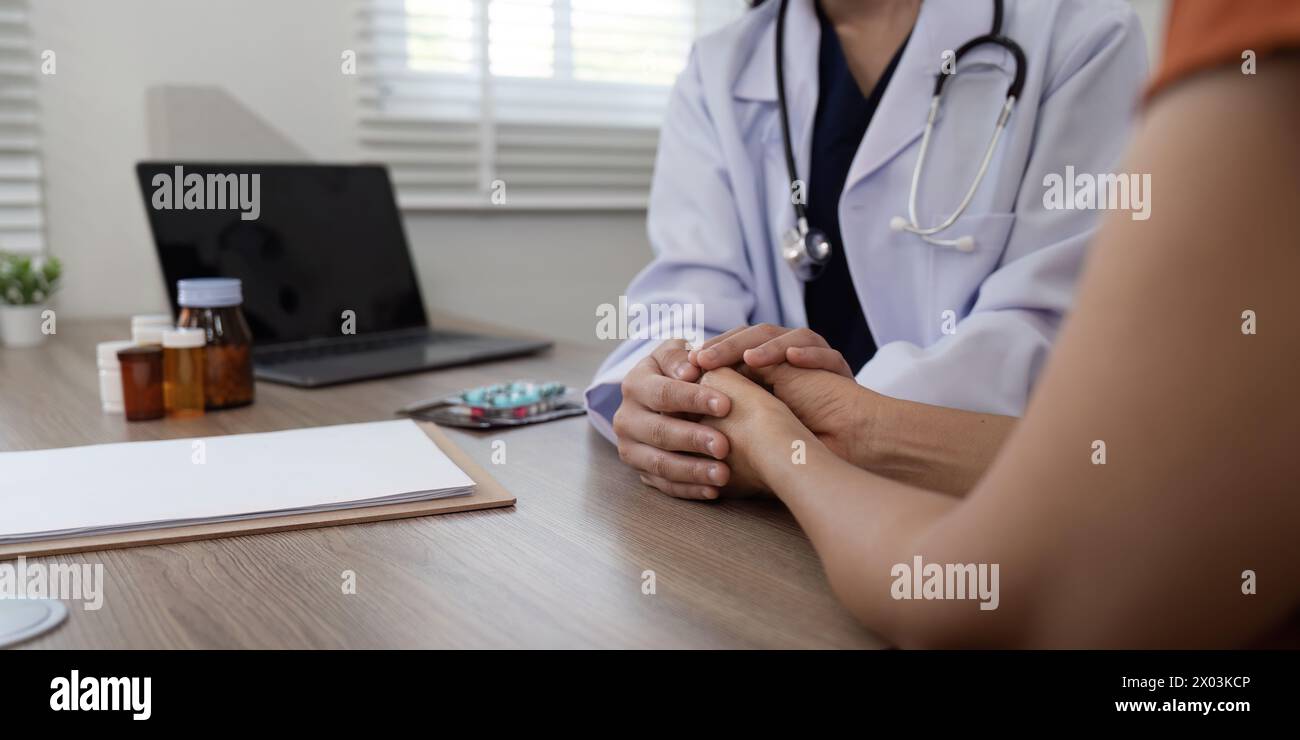 Doctor holding patient hand cheer and encourage while checking your ...