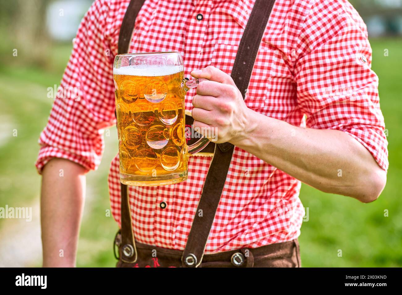 Bavaria, Germany - April 7, 2024: A man in lederhosen and traditional ...