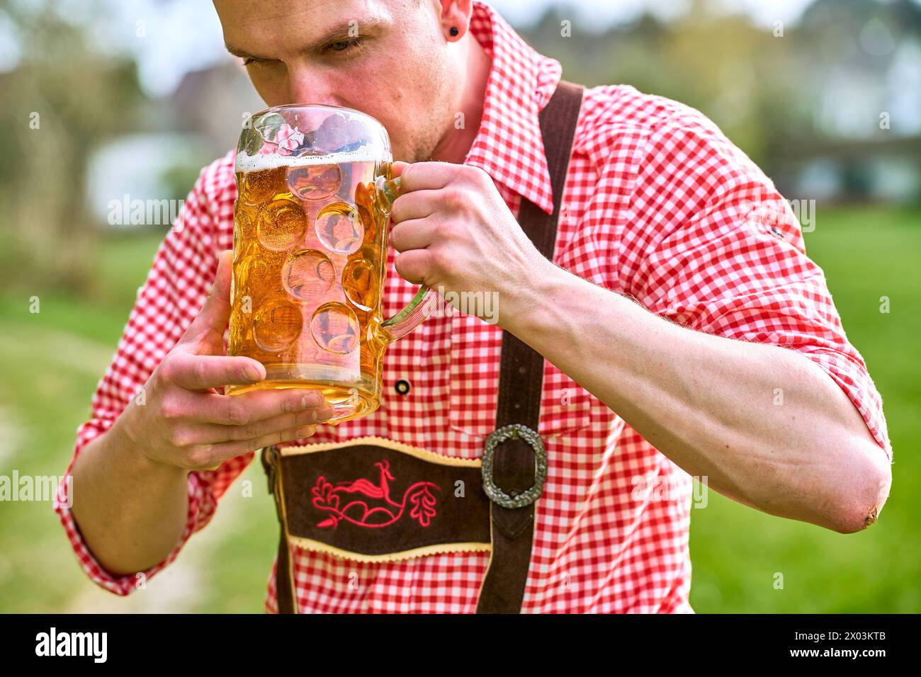 Bavaria, Germany - April 7, 2024: A man in lederhosen and traditional ...