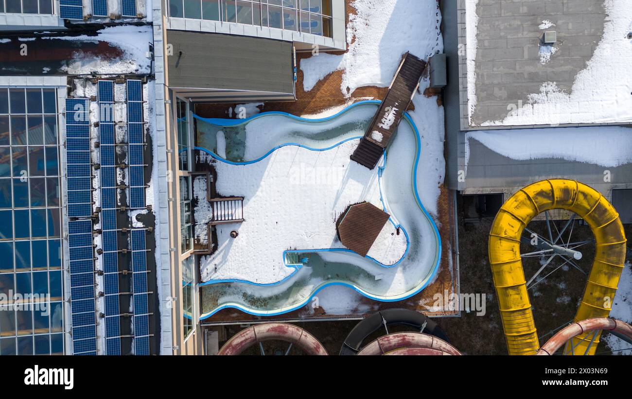 Drone photography of under roof water park and frozen water slide ...