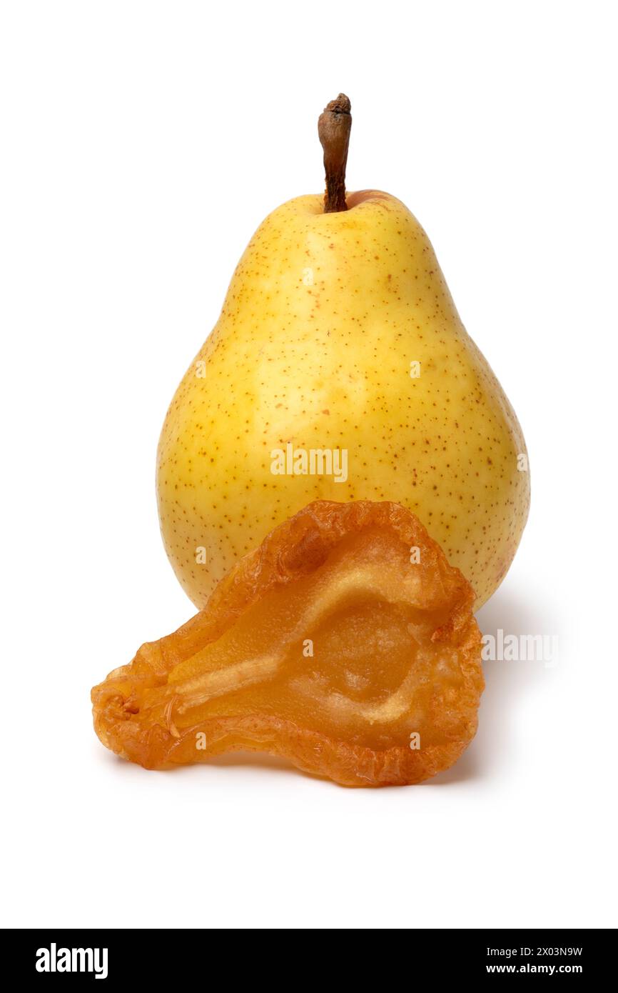 Single dried pear fruit and a fresh pear close up isolated on white ...