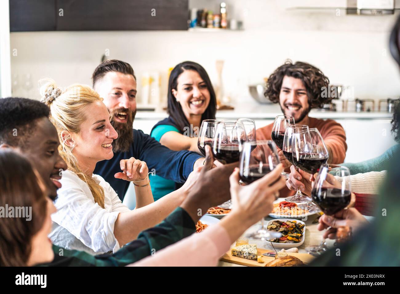 Friends dinner party cheese board hi-res stock photography and images ...