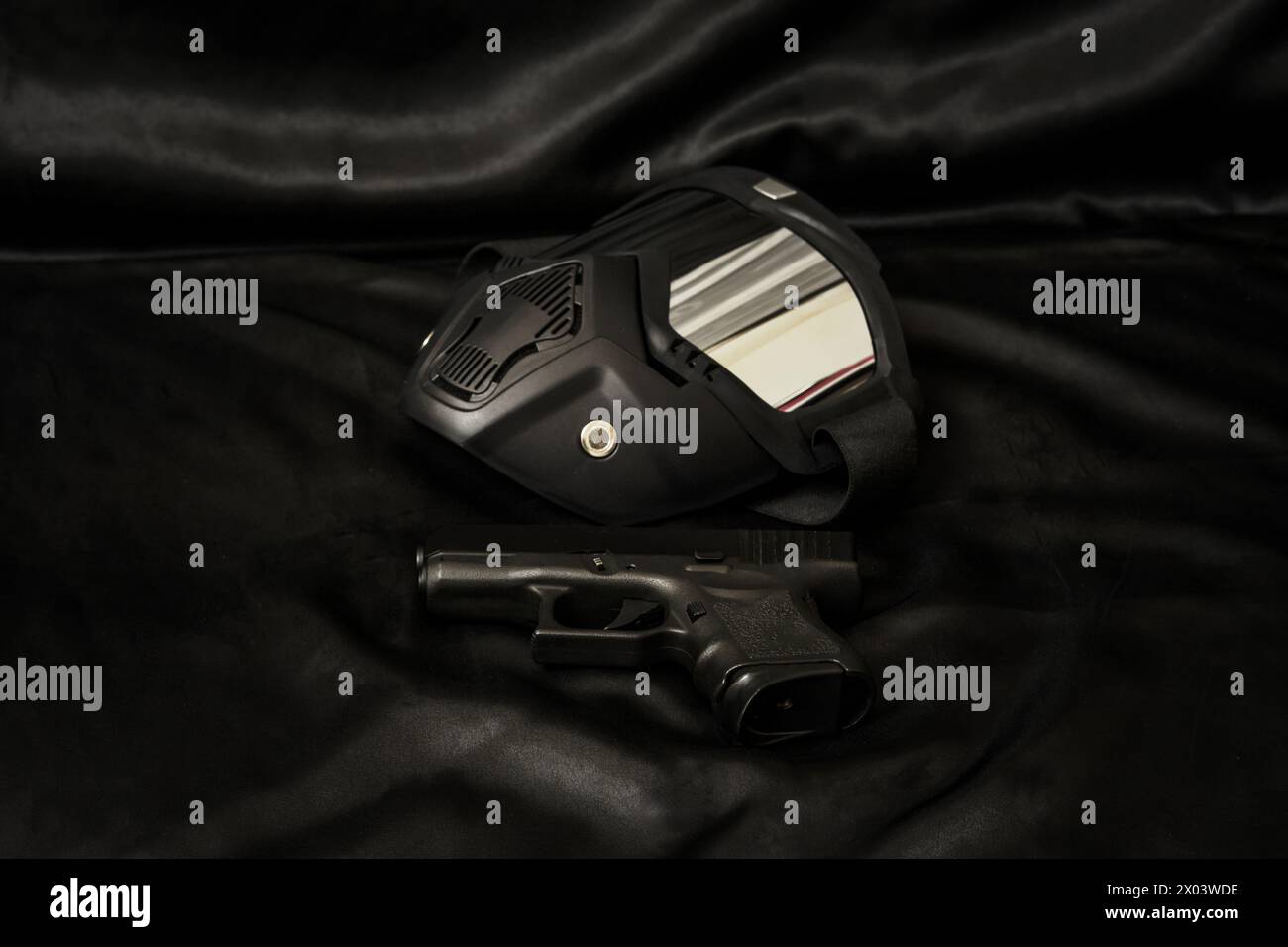 Black gun mask hi-res stock photography and images - Alamy