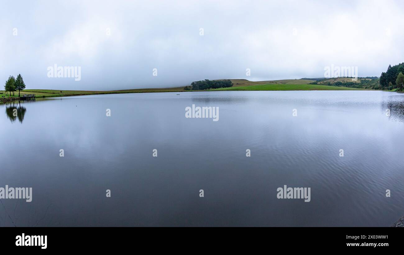 Countryside rural mountains overlooking farm dam scenic calm water ...