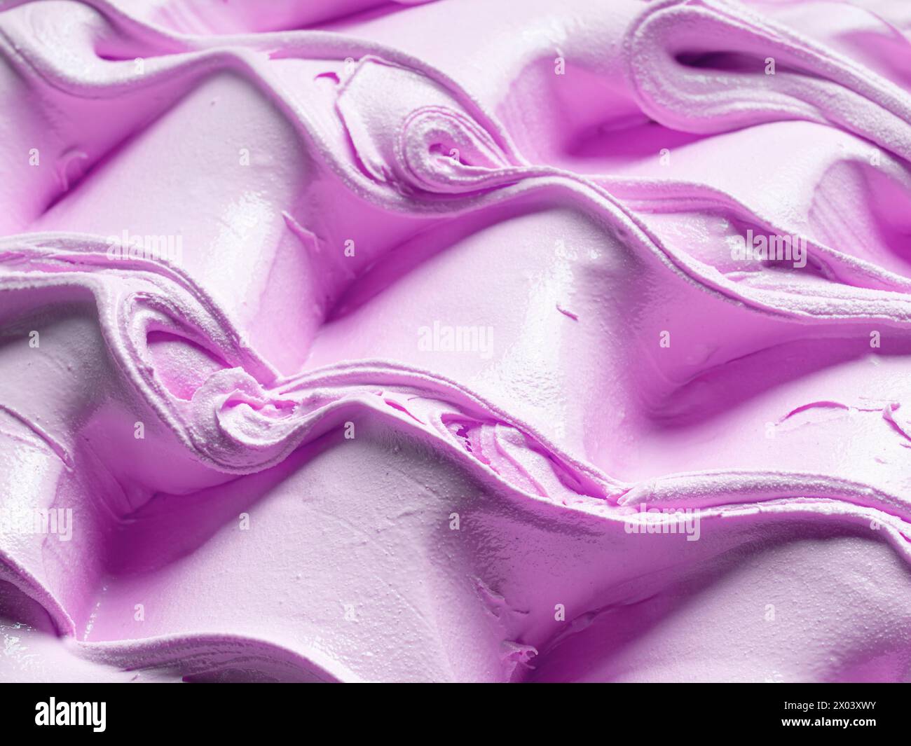 Frozen creamy bubble gum flavour gelato - full frame detail. Close up ...