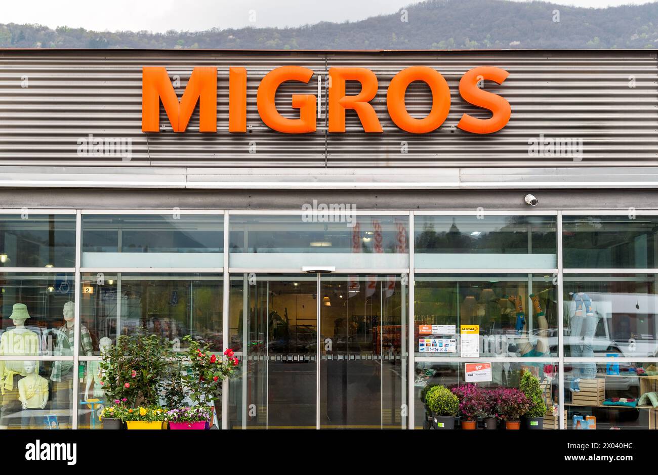 Agno, Ticino, Switzerland - April 9, 2024: View of the Migros supermarket in Agno, it is the ...