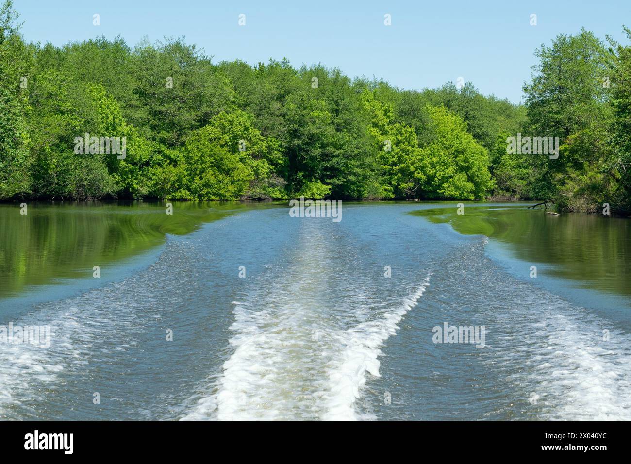 Wake jet. A disturbed strip of water remaining behind the stern of a ...