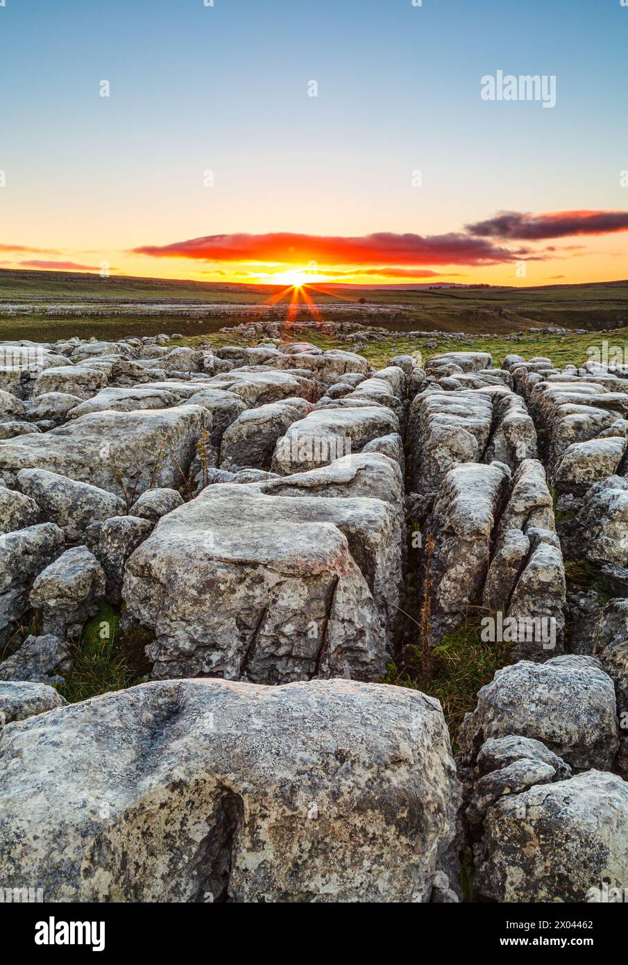 Sunrise on the limestone pavement at Malham Lings, Yorkshire Dales ...