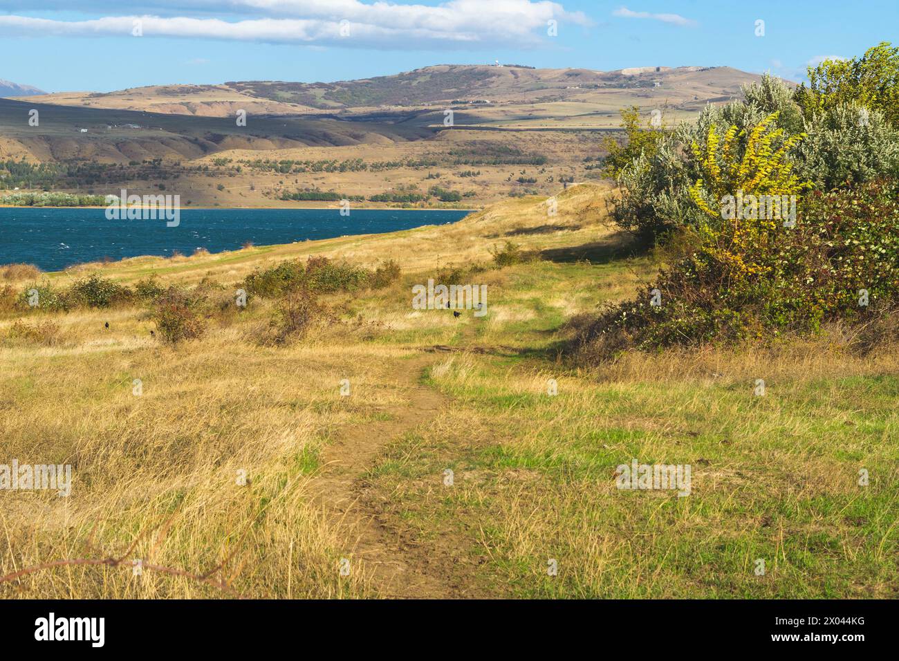 Beautiful natural landscape. Shadow of clouds on the ground. Lake and ...