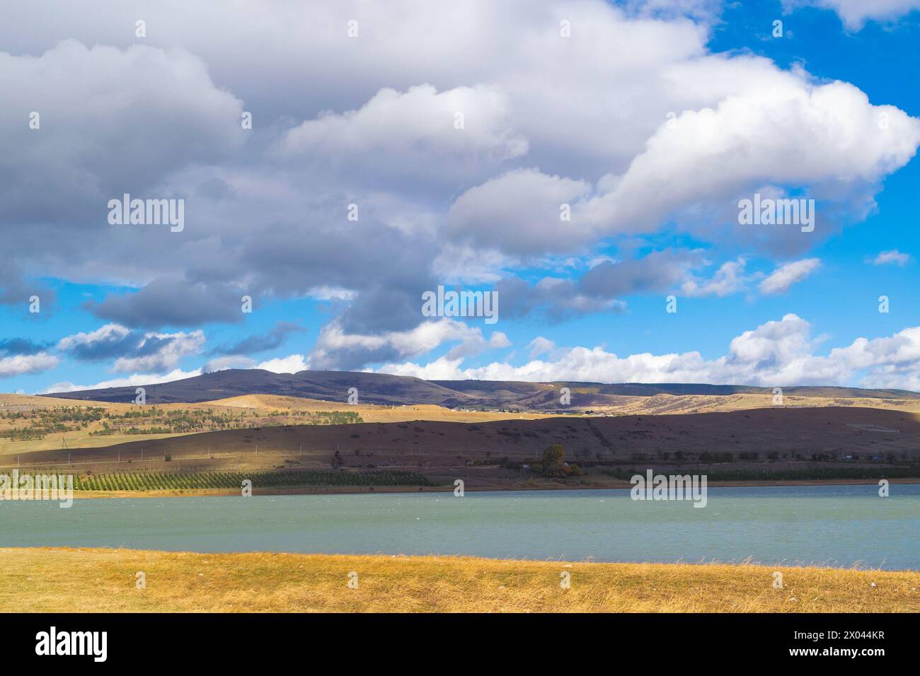 Beautiful natural landscape. Shadow of clouds on the ground. Lake and ...