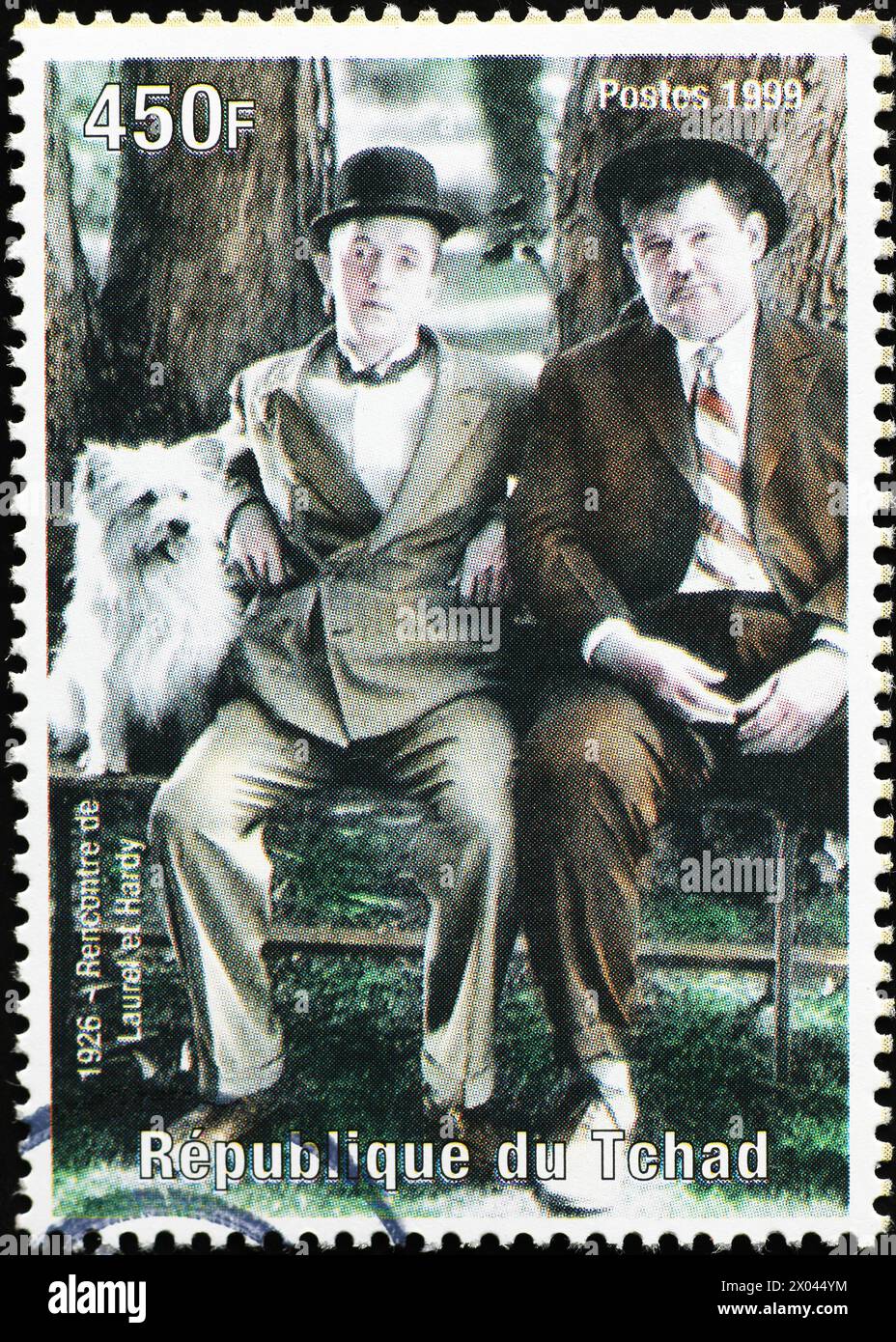 Old picture of Stan Laurel and Oliver Hardy on stamp Stock Photo - Alamy