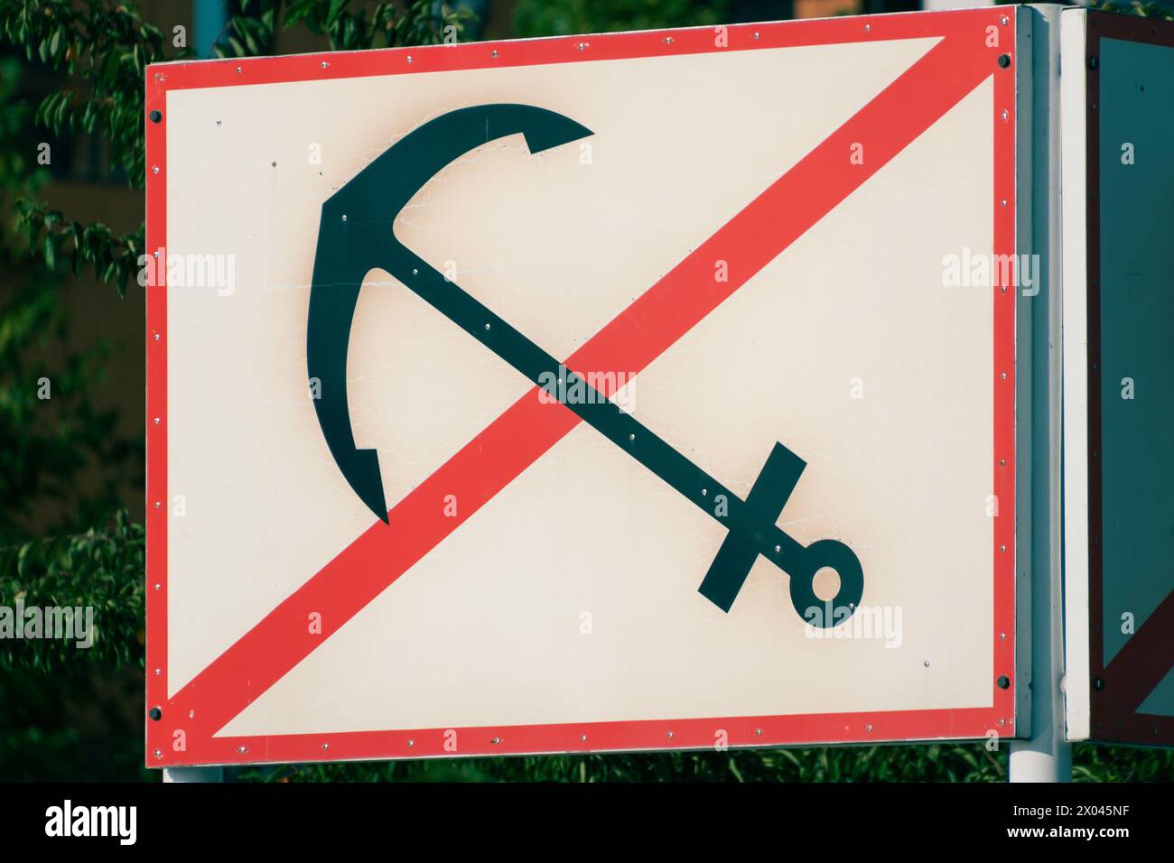 "No mooring" sign for ships. A sign with a crossed out anchor ...