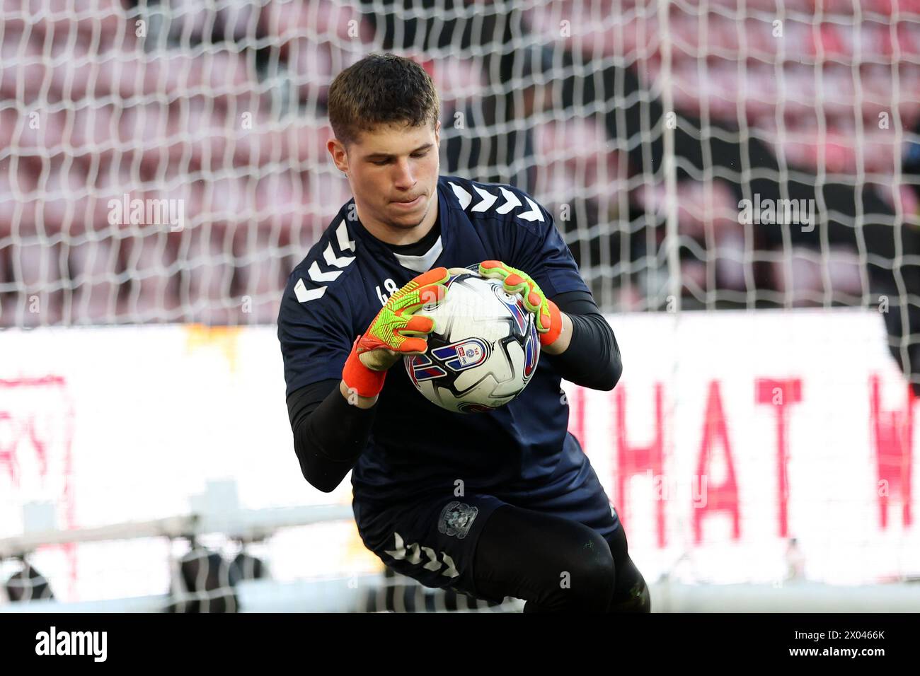 Coventry City goalkeeper Luke Bell warms up ahead of the Sky Bet ...