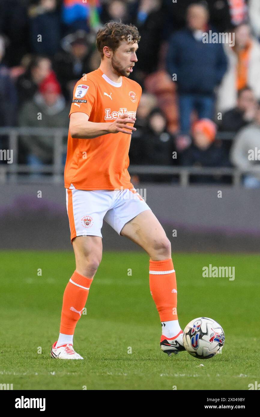 Matthew Pennington of Blackpool in action during the Sky Bet League 1 ...