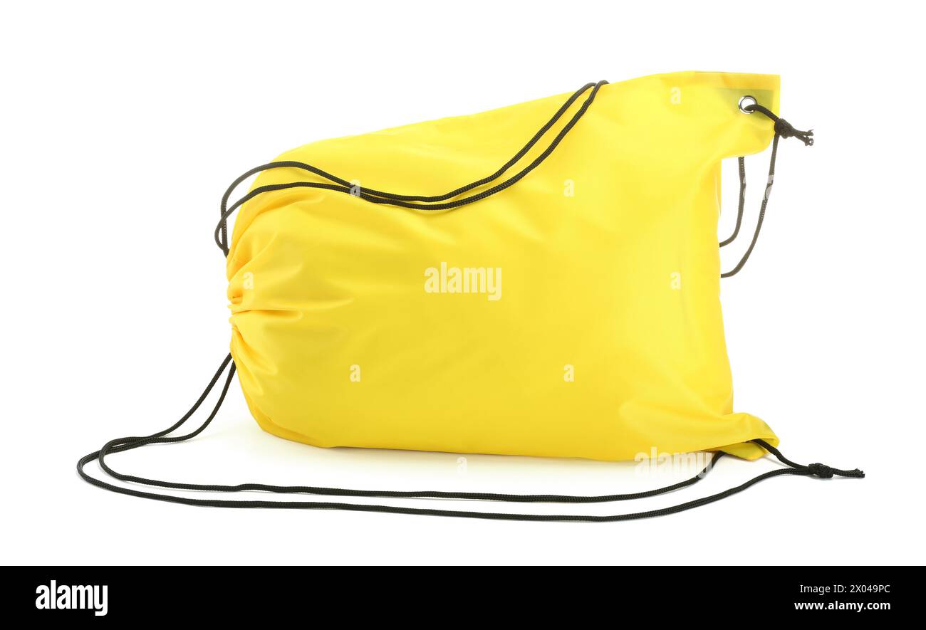 One yellow drawstring bag isolated on white Stock Photo - Alamy