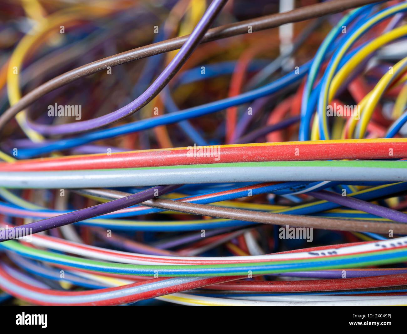 Close-up of confused mixed multi-colored wires Stock Photo - Alamy