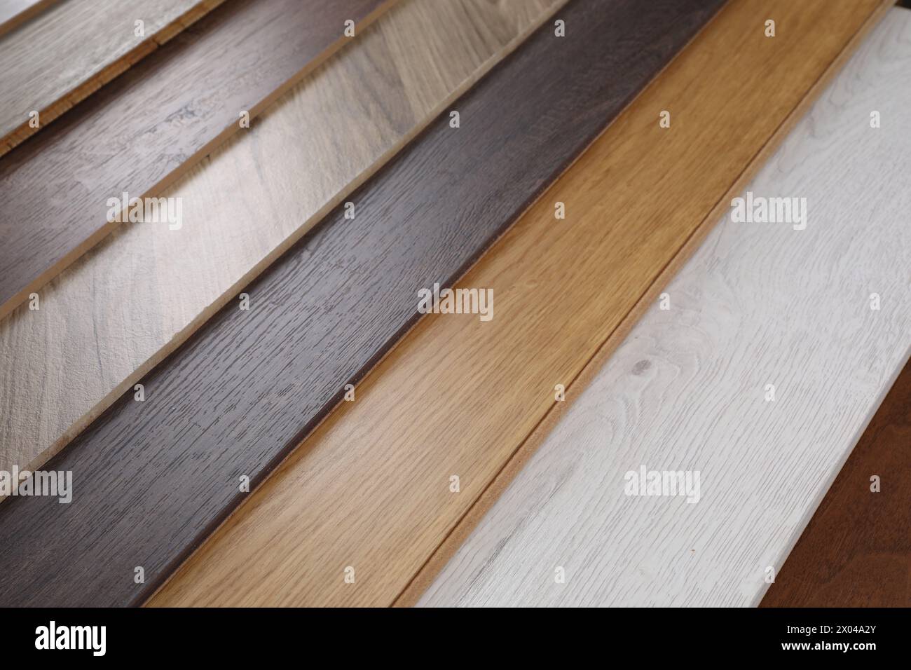 Different samples of wooden flooring as background, flat lay Stock ...