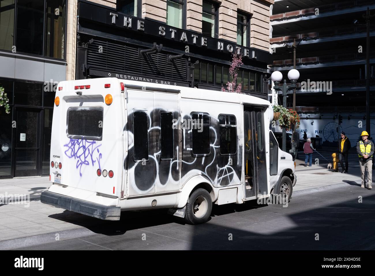 Seattle, USA. 18th Mar, 2024. Grafitti on a bus in The Blade Stock ...