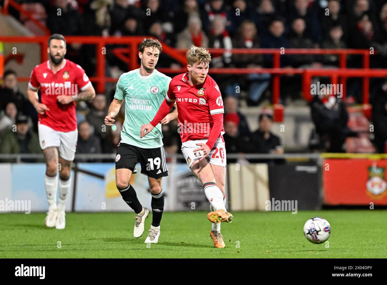 Andy Cannon of Wrexham passes the ball, during the Sky Bet League 2 ...