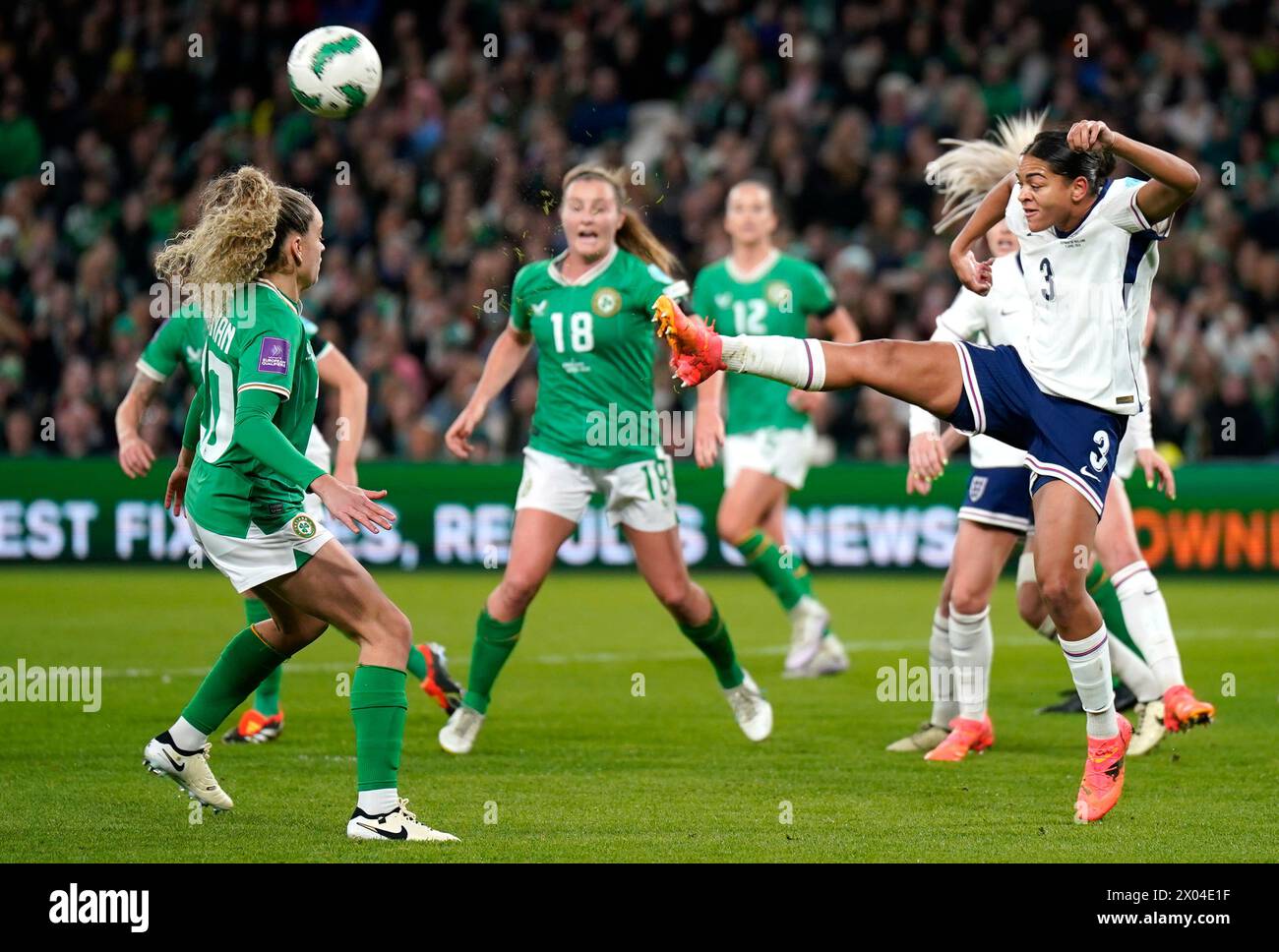 England's Jess Carter (right) clears the ball during the UEFA Women's ...