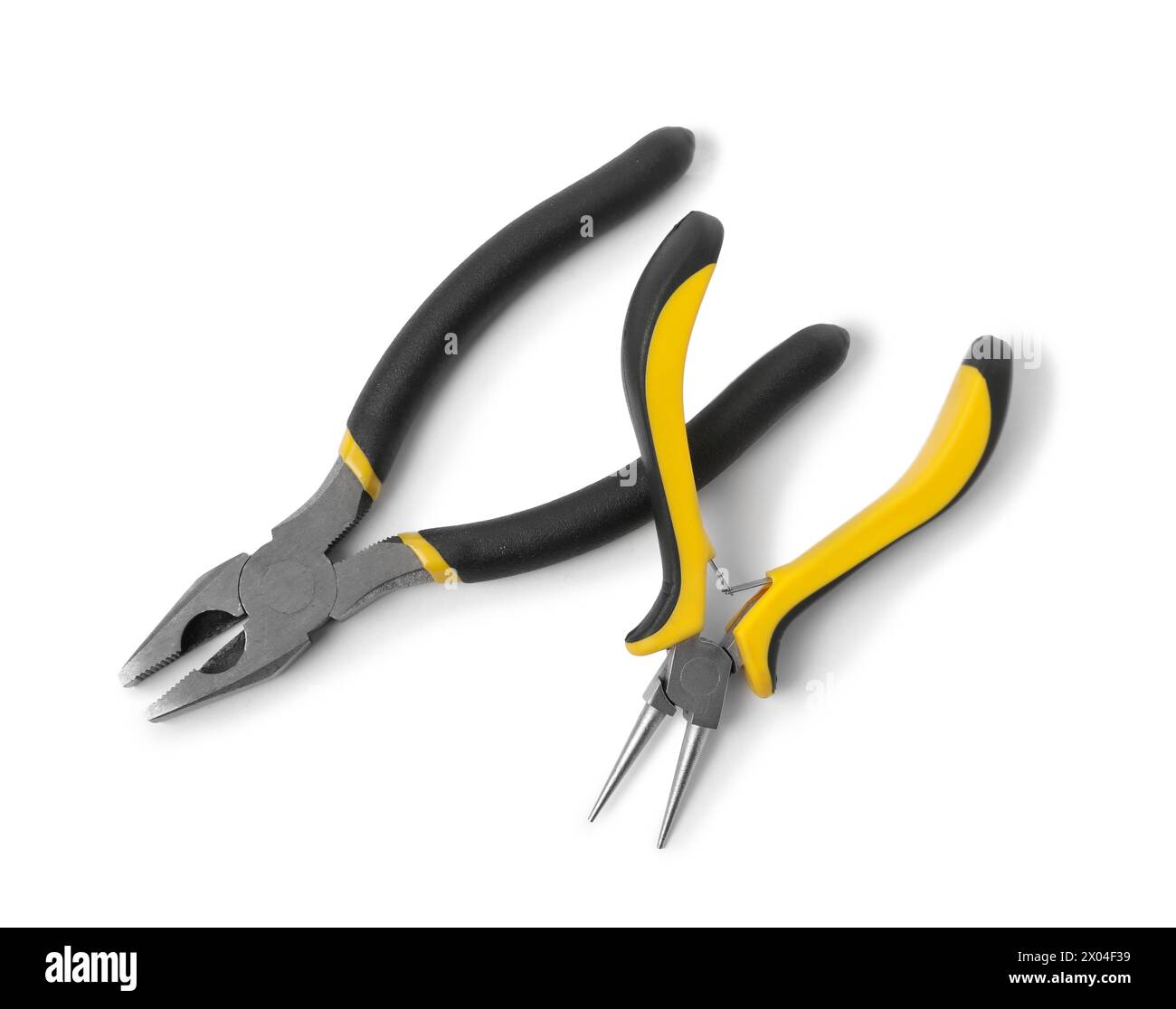 Different pliers isolated on white. Construction tool Stock Photo - Alamy