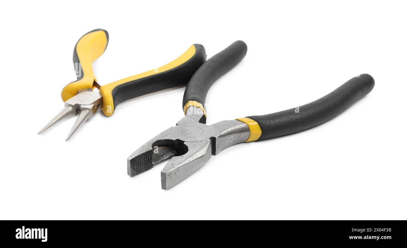 Different pliers isolated on white. Construction tool Stock Photo - Alamy