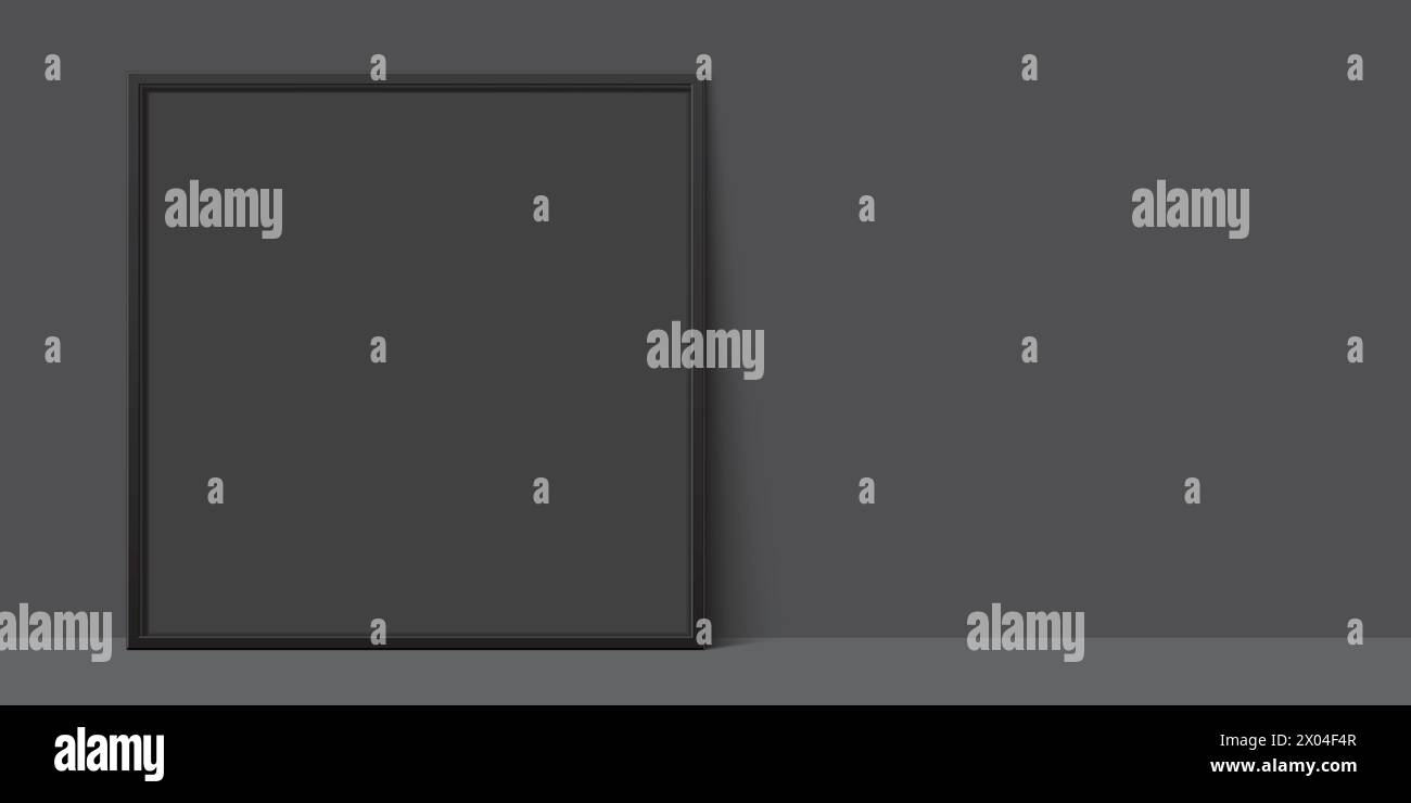Square shape black poster frame leaning against a grey wall background ...